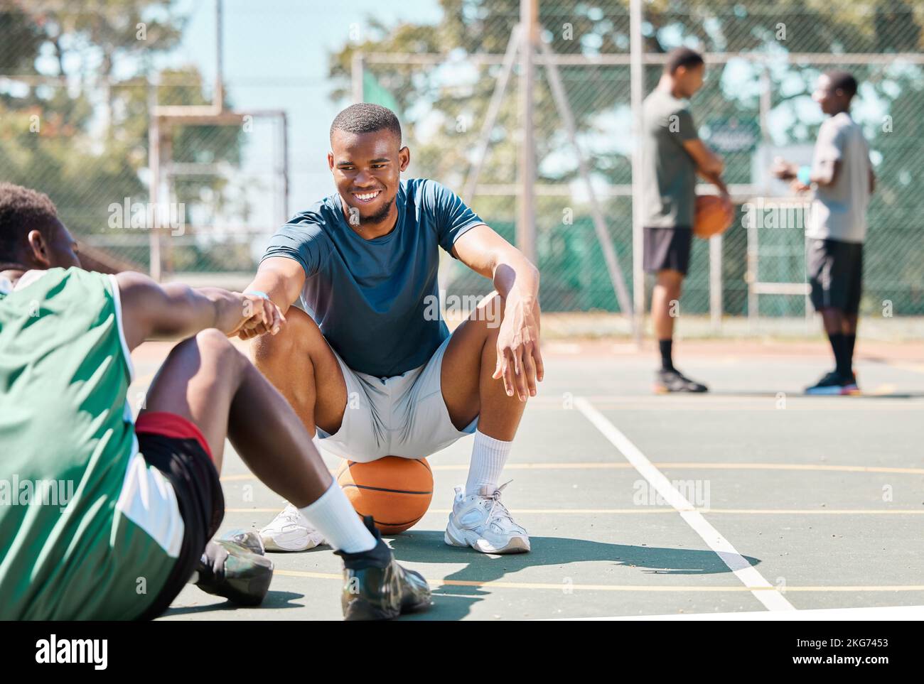 Sports, basketball and friends, men relax and fist bump on basketball ...