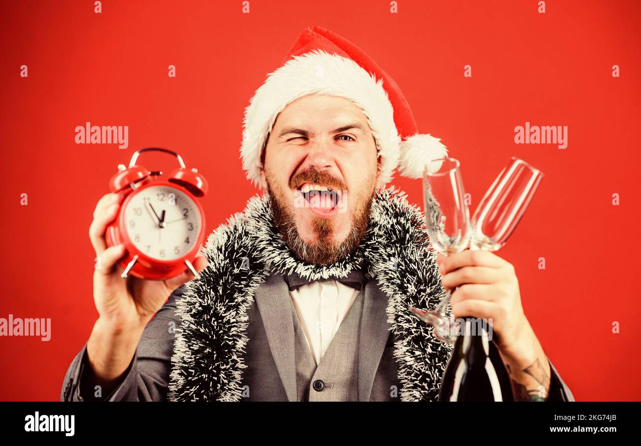 i am ready. businessman santa hat with tinsel and clock. christmas is ...