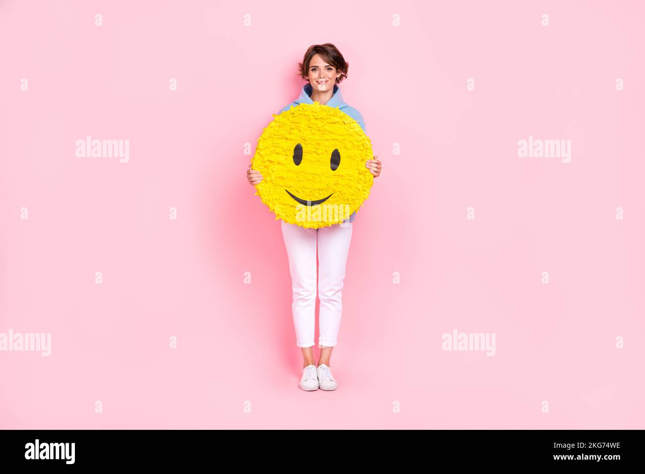 Full body portrait of pretty cute lady arms hold big paper card smile ...