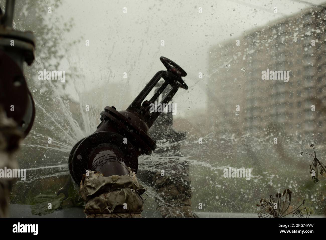 Pipeline accident. Water pours from well. Torn valve. Emergency Stock ...