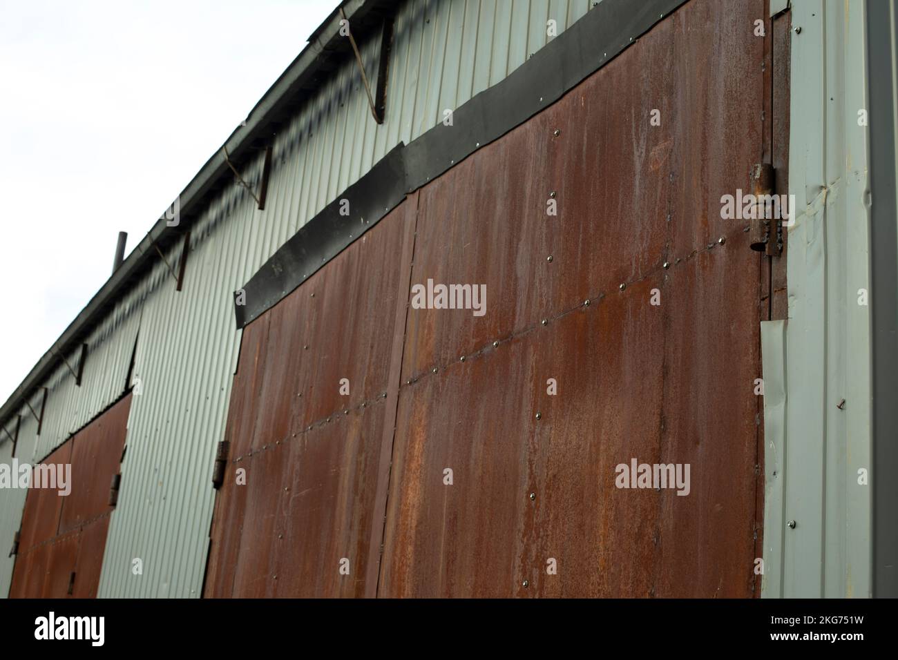 Rusty gates in building. Rust on metal. Storage room. Industrial area ...