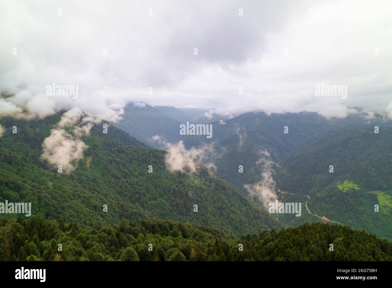Aerial panoramic shot of foggy mountains and forests. Camlihemsin, Rize ...