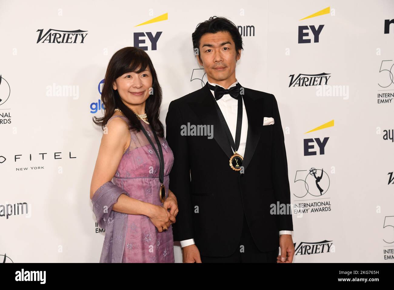 Kohei Higuchi and Yuko Hashizaki walking the red carpet at the International Emmy Awards at the ...