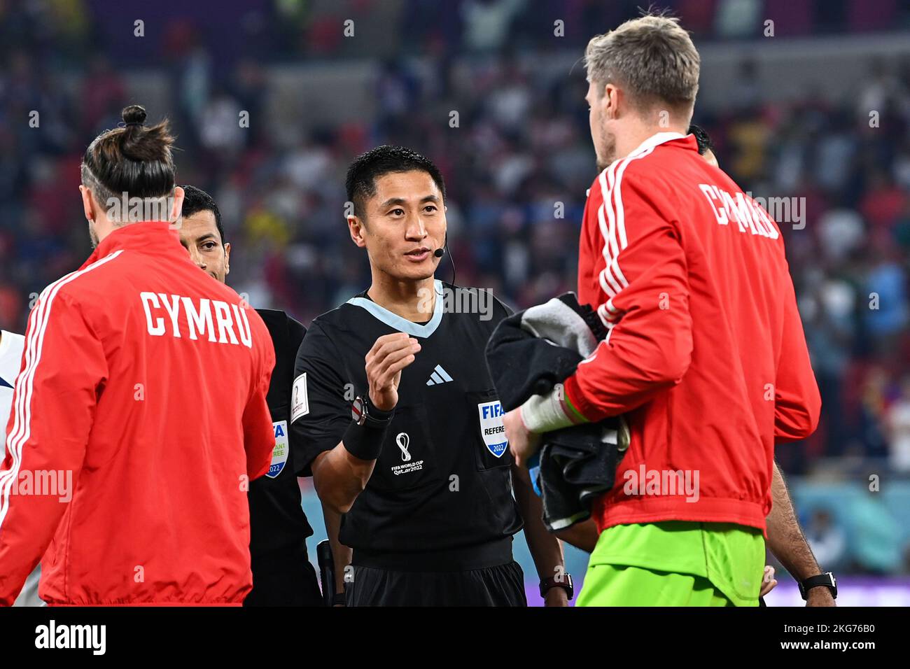 Chinese referee Ma Ning is serving as the fourth official in the 2022 ...