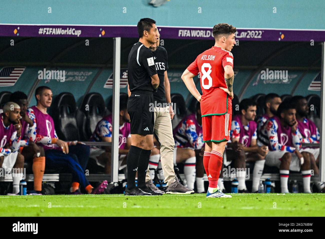 Chinese referee Ma Ning is serving as the fourth official in the 2022 ...