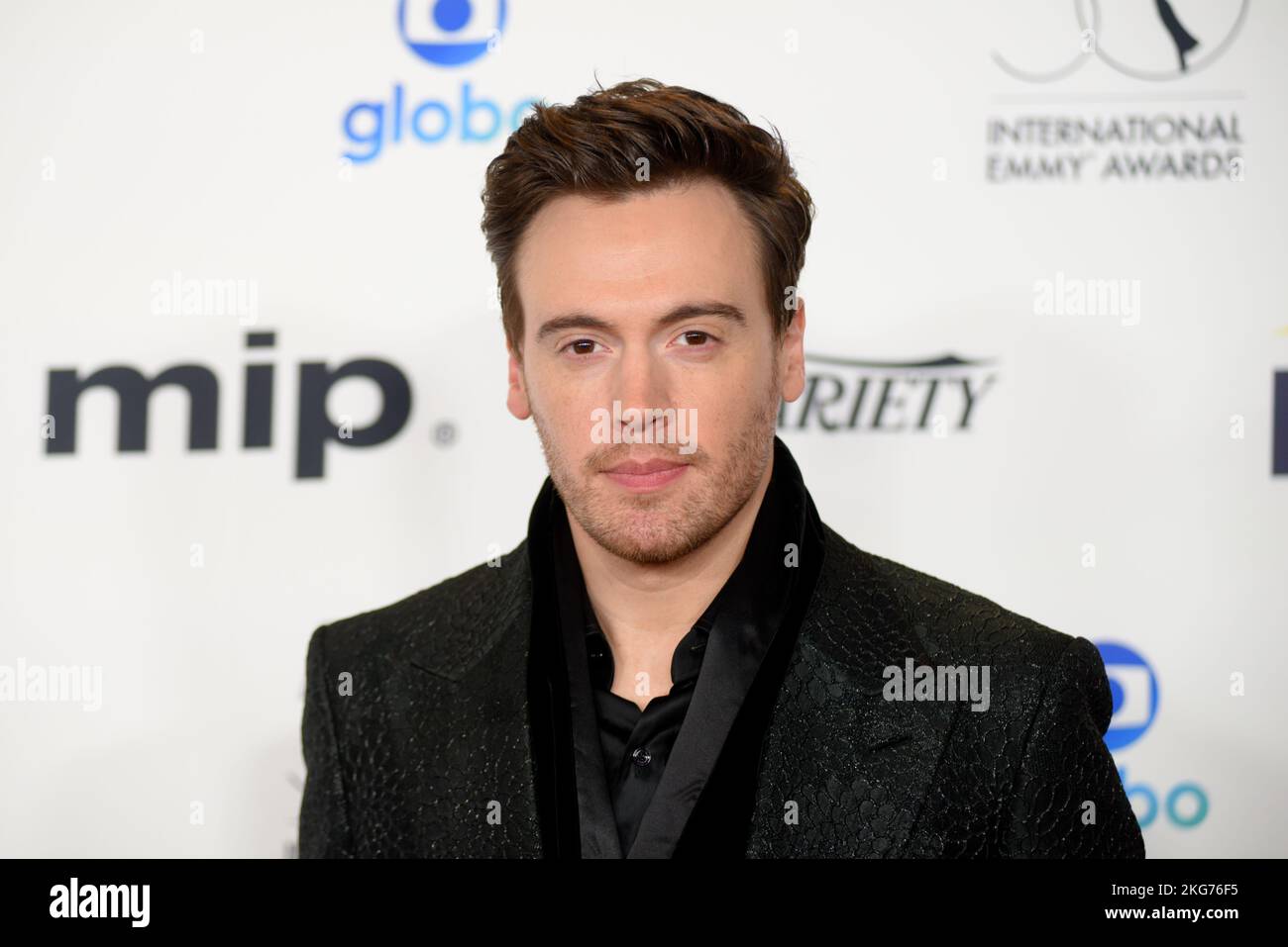 Erich Bergen walking the red carpet at the International Emmy Awards at ...