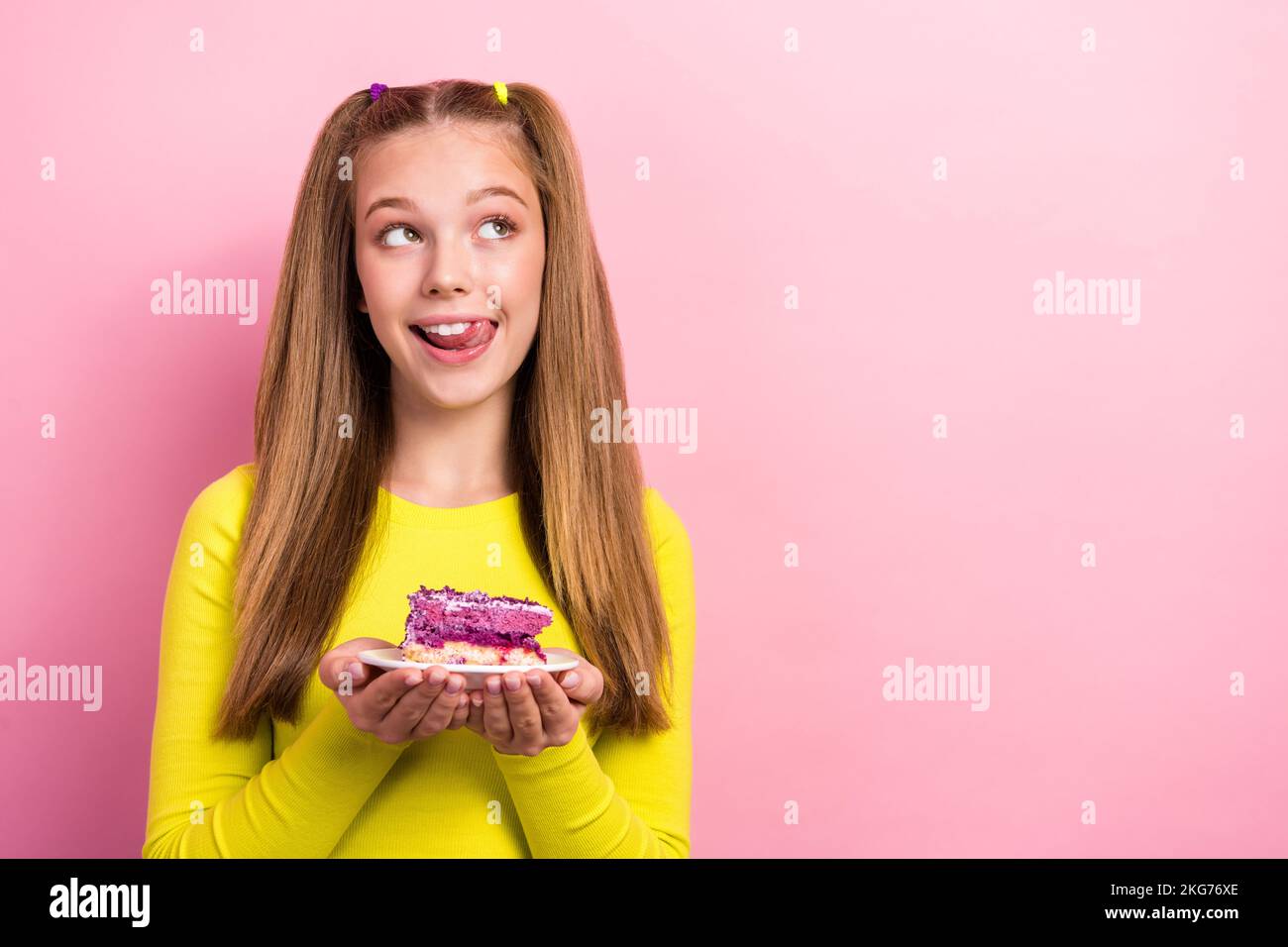 Photo of tricky cunning school girl dressed yellow top ready eating ...