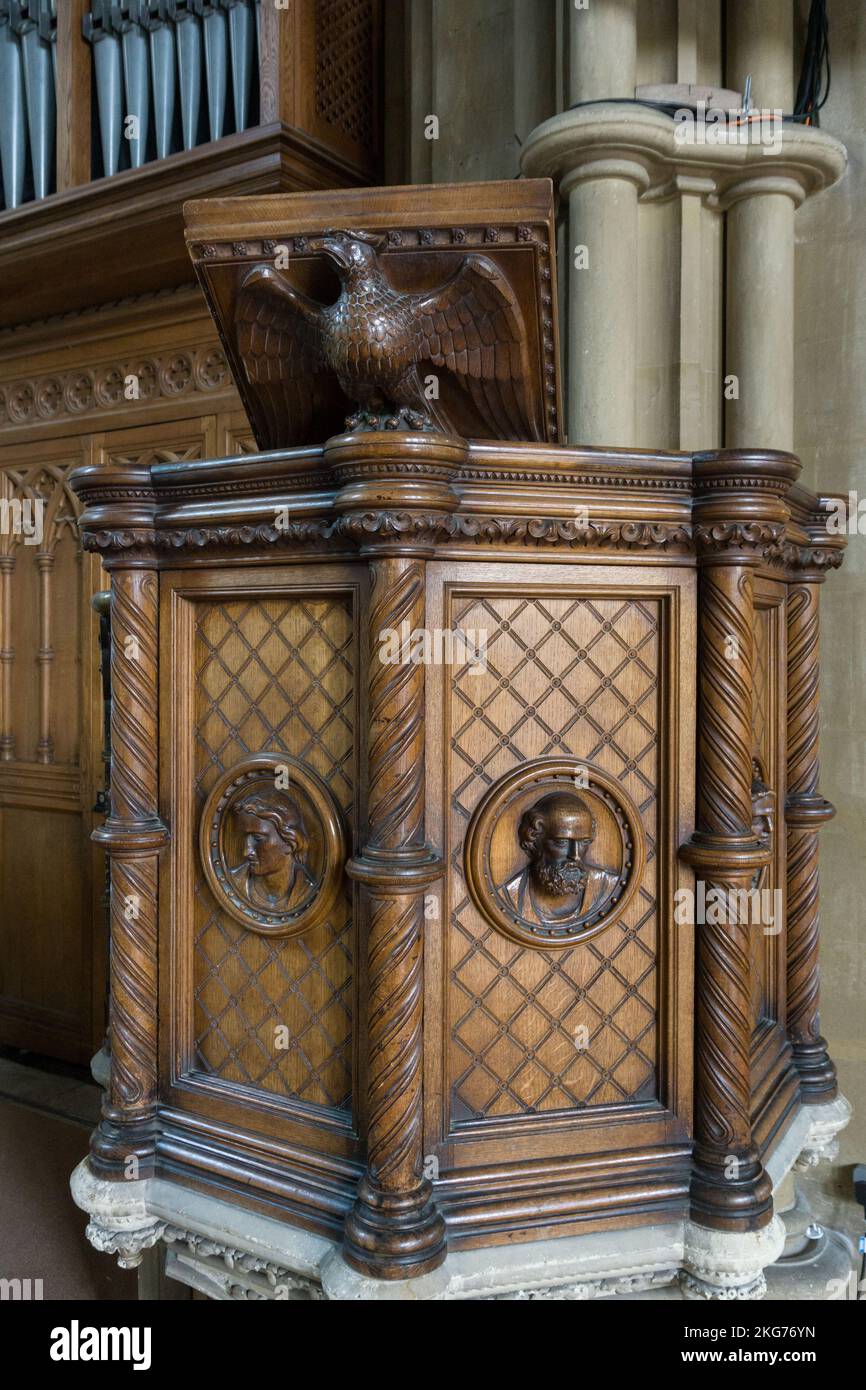 Carved oak pulpit with an eagle book rest, church of St Peter and St ...