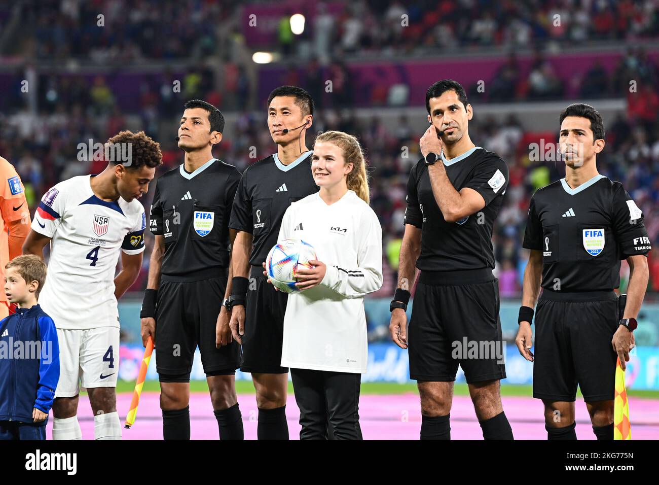 Chinese referee Ma Ning is serving as the fourth official in the 2022 ...