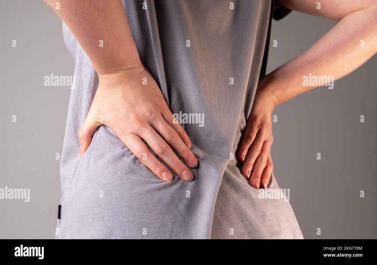 Back ache concept. Acute pain of loin, lower back. High quality photo ...