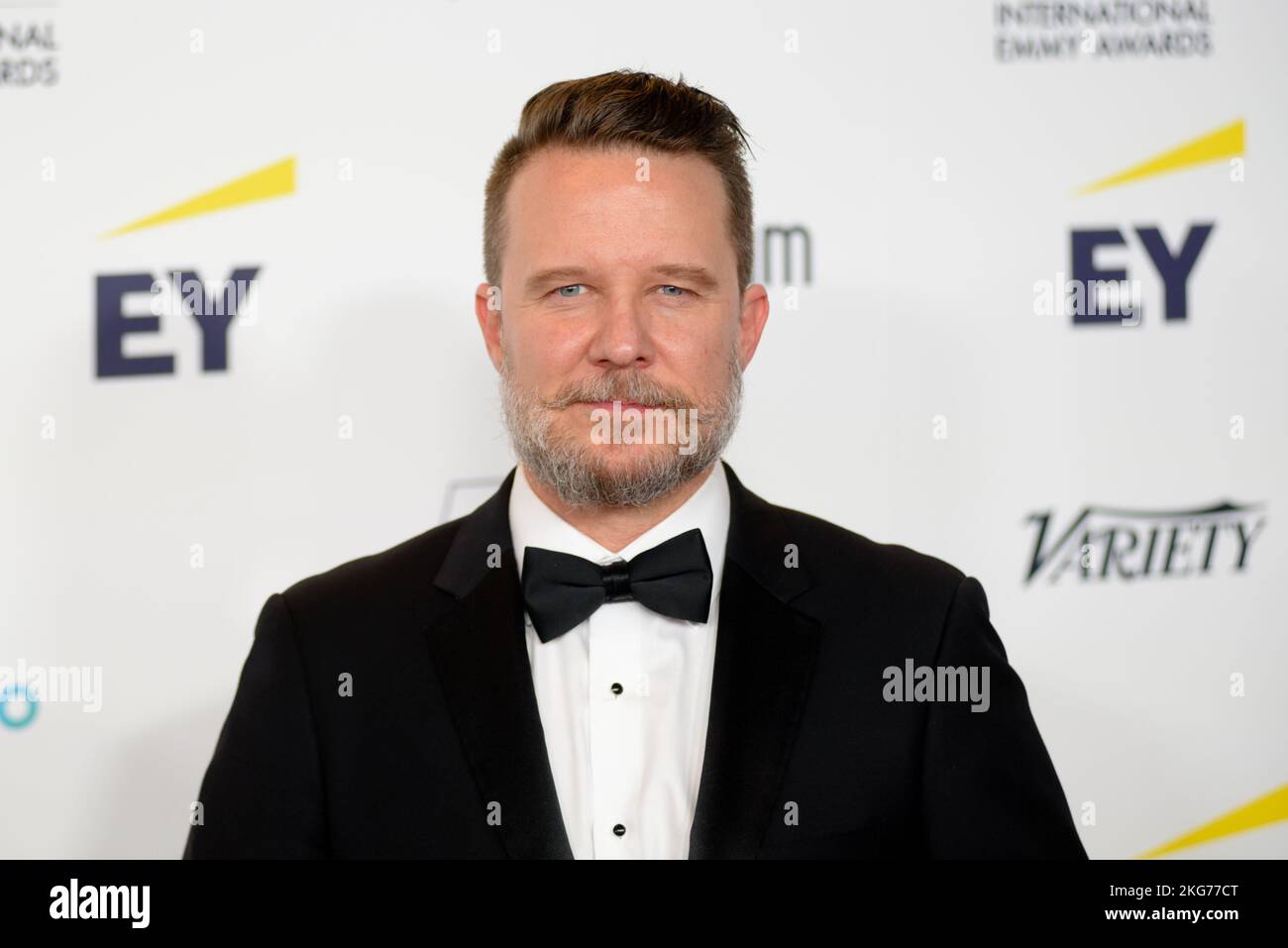 Will Chase walking the red carpet at the International Emmy Awards at ...