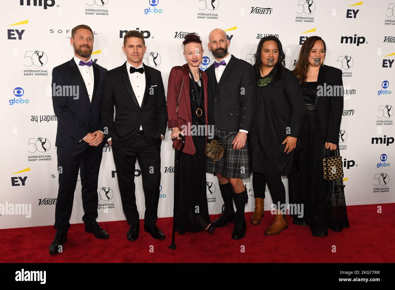 Craig Gainsborough-Waring and Cole Meyers, with team, walking the red ...