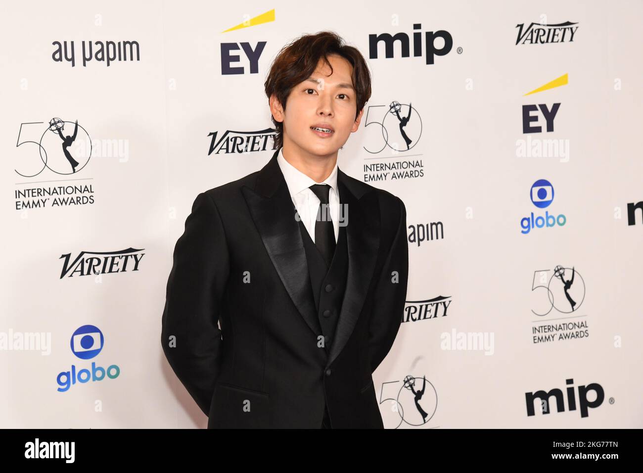 Yim Siwan walking the red carpet at the International Emmy Awards at ...