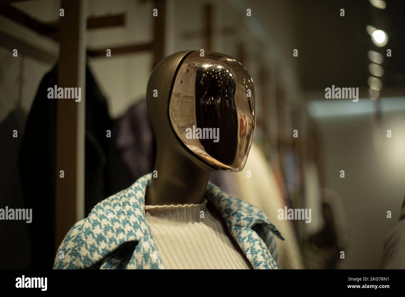 Golden mask on face. Mannequin in clothing store. Figure of person ...
