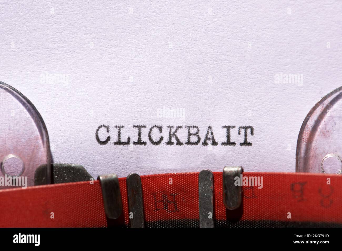 Clickbait word written with a typewriter Stock Photo - Alamy