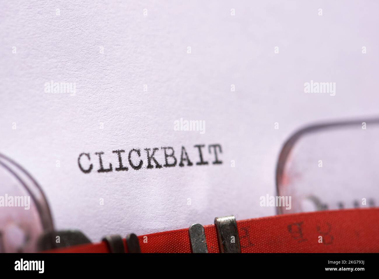 Clickbait word written with a typewriter Stock Photo - Alamy