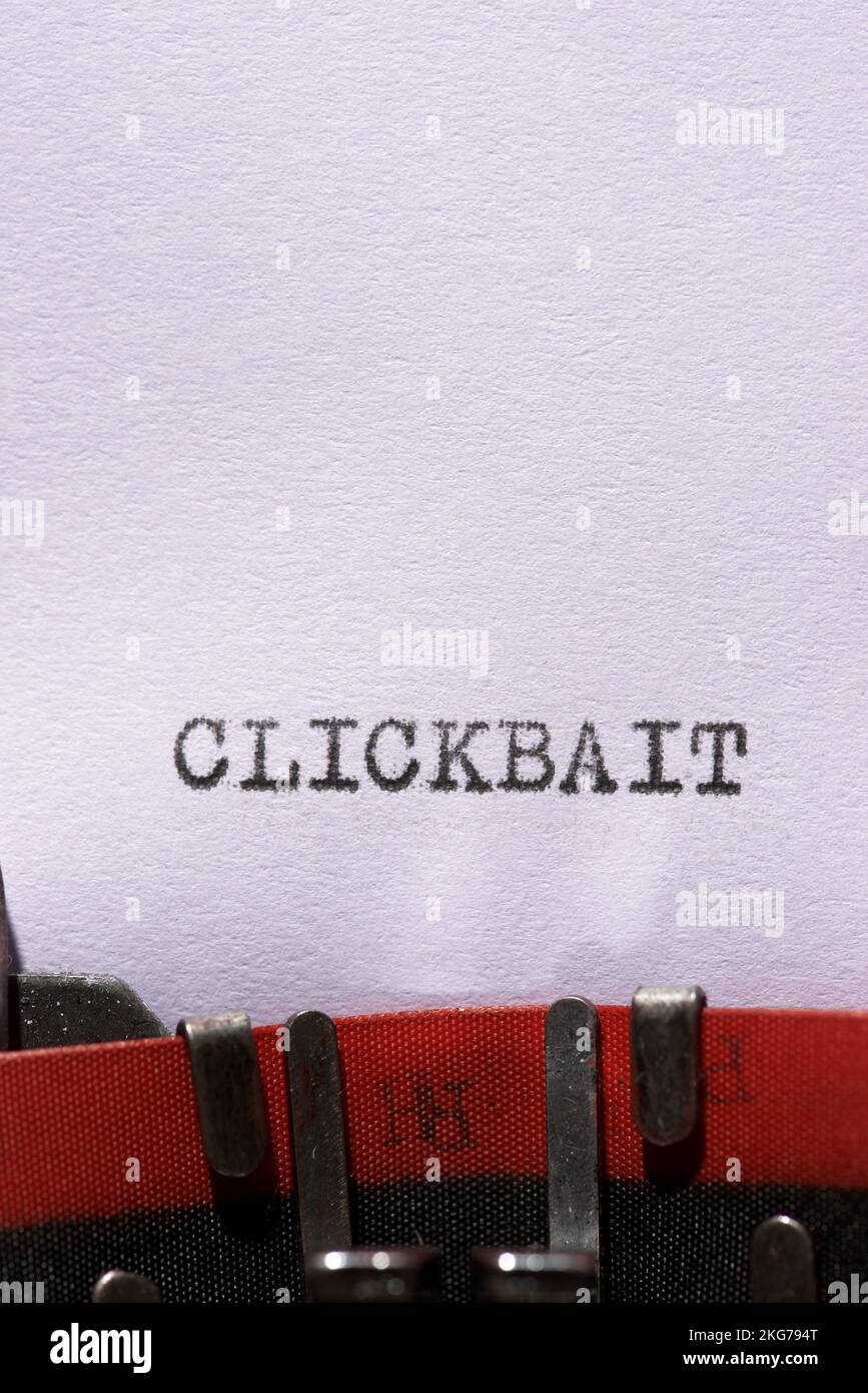 Clickbait word written with a typewriter Stock Photo - Alamy
