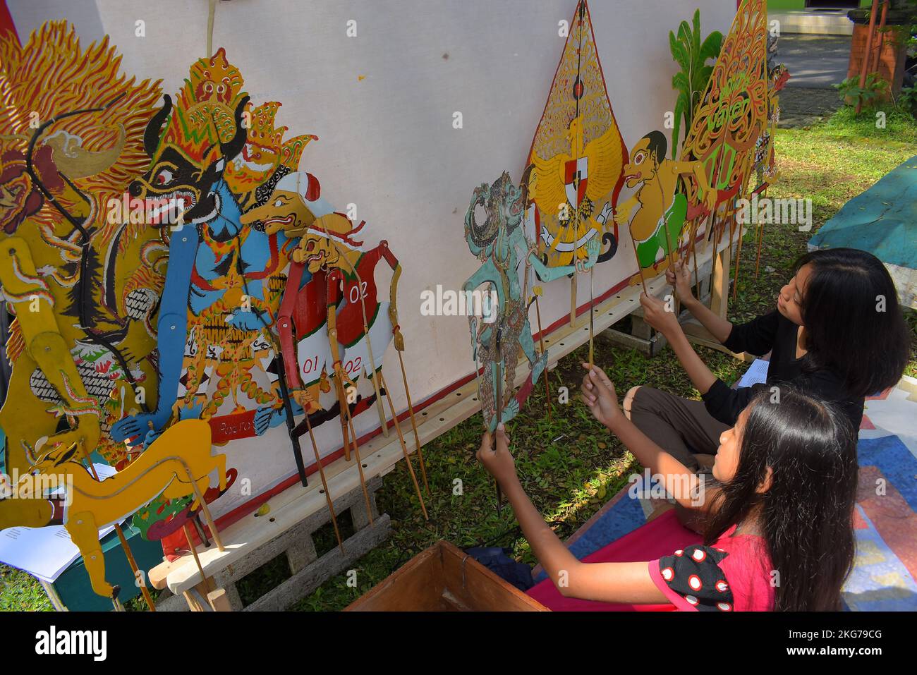 Girl playing with puppets hi-res stock photography and images - Alamy