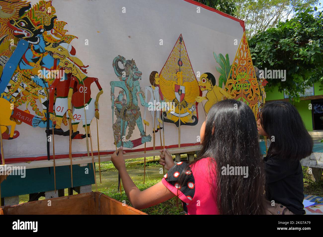 the female puppeteer is practicing playing the puppet Stock Photo - Alamy