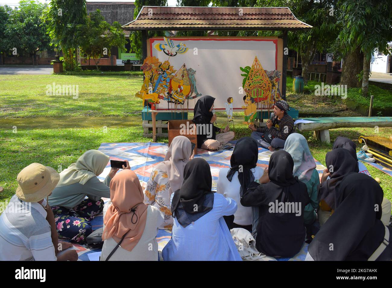 the female puppeteer is practicing playing the puppet Stock Photo - Alamy