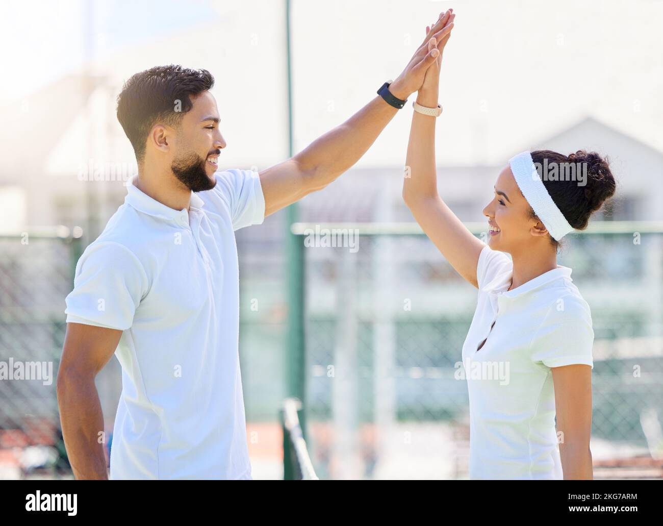 Tennis, high five and motivation with a sports couple in celebration of ...
