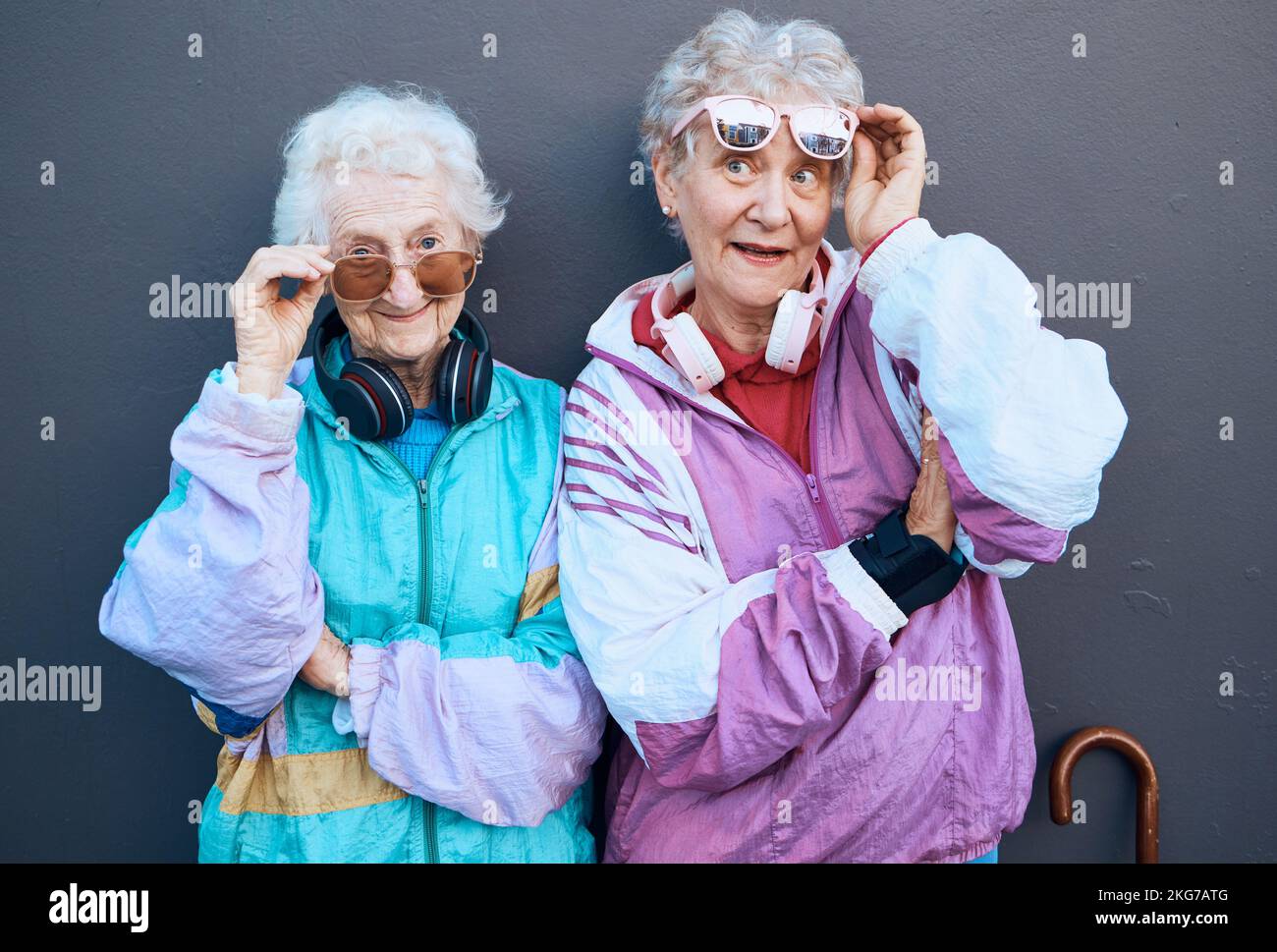 Fashion, funky and friends with a senior woman pair standing outdoor on ...