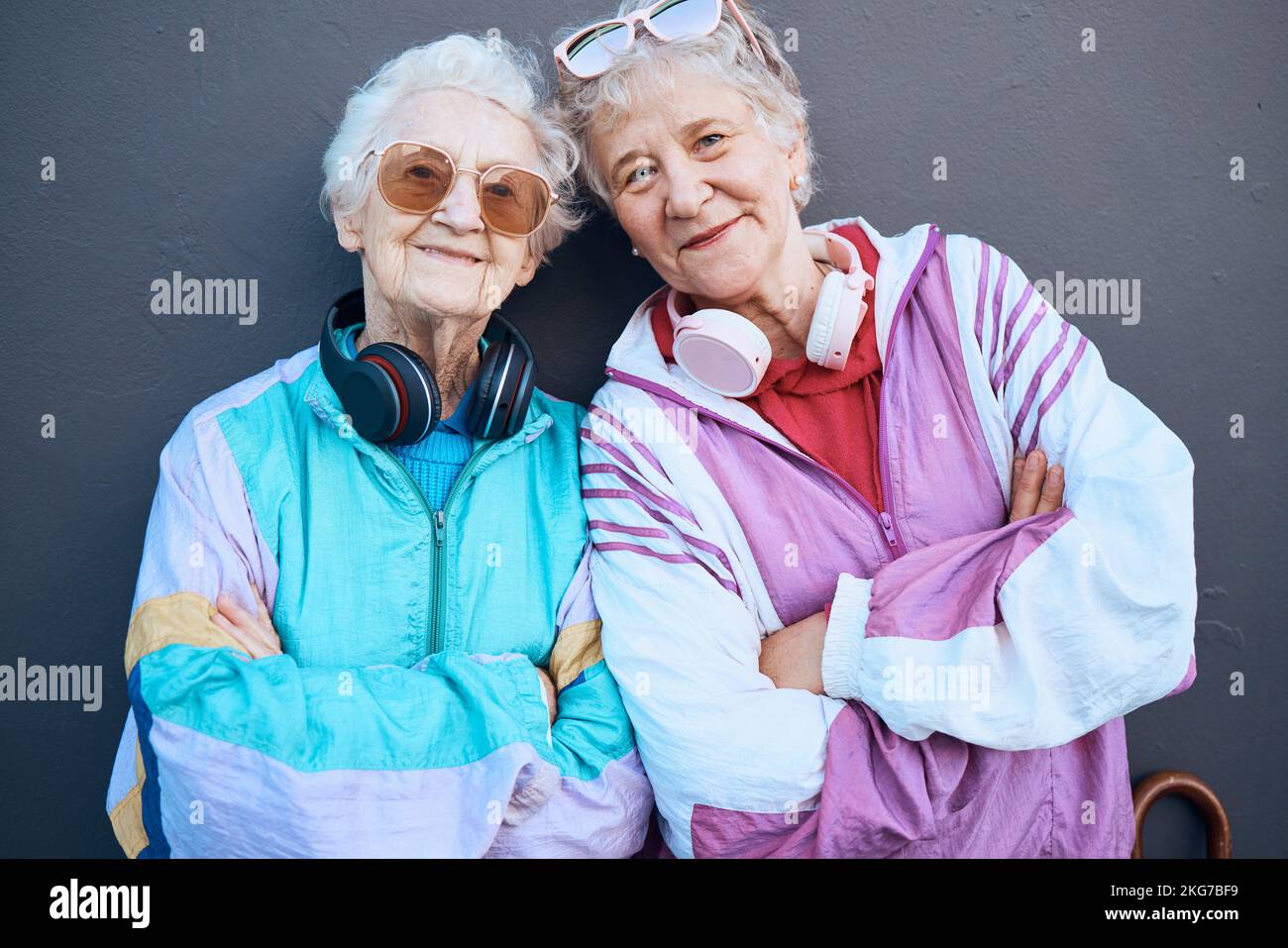 Portrait, fashion and friends with a senior woman pair standing arms ...