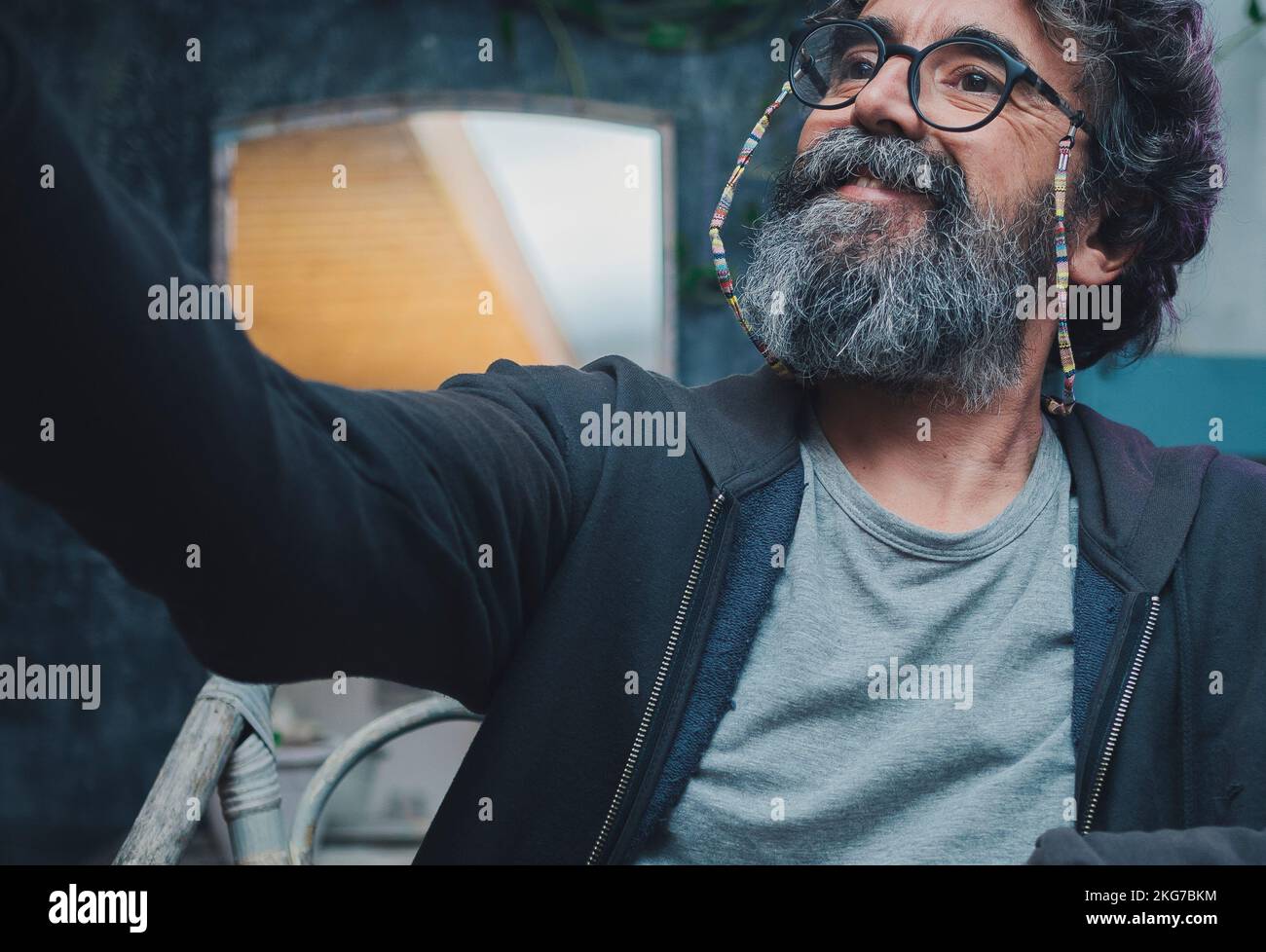 man with beard taking a self-portrait Stock Photo - Alamy