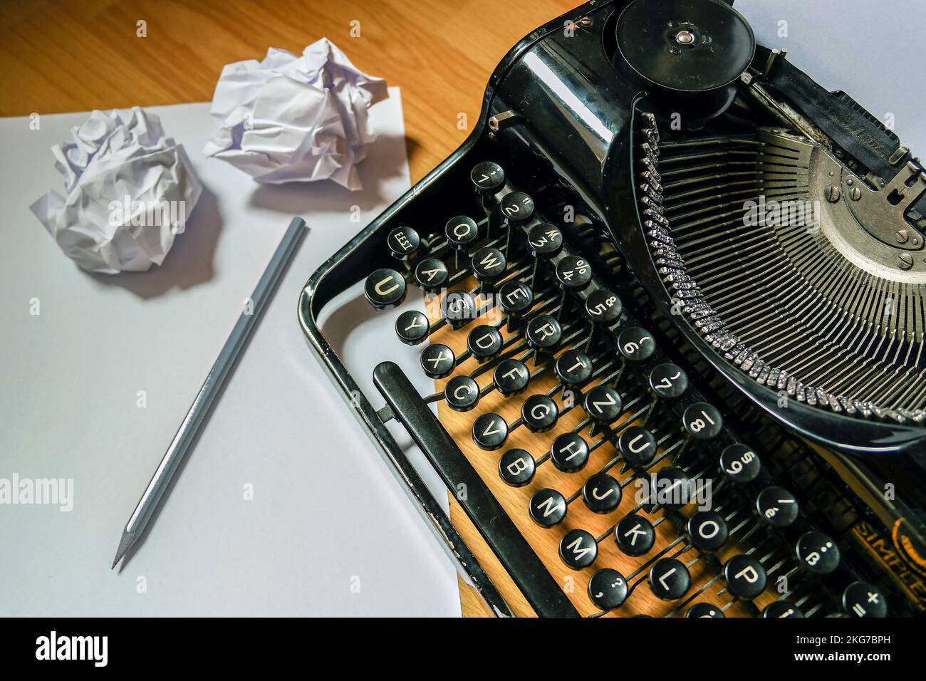 Old antique typewriter with colored pencils and paper Stock Photo - Alamy