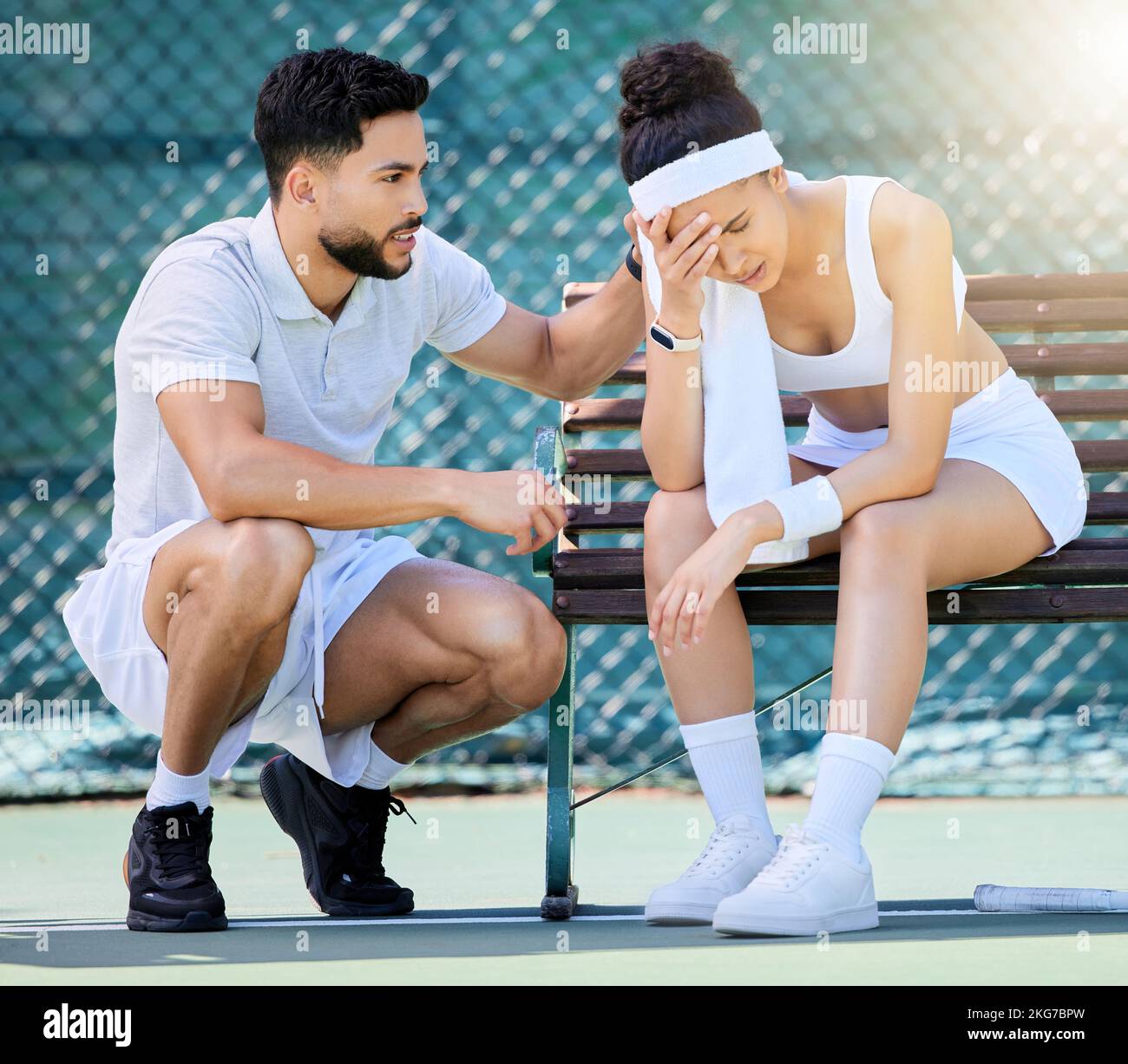 Tennis, support and loss with a sports woman feeling sad while a male ...