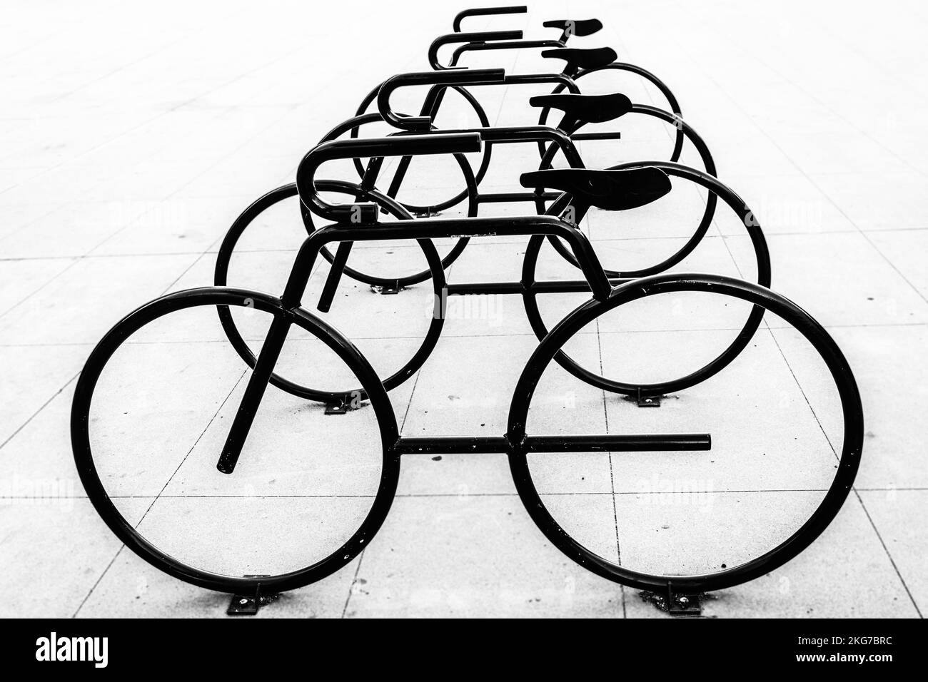 The black bicycle-shaped bike racks in the street Stock Photo - Alamy