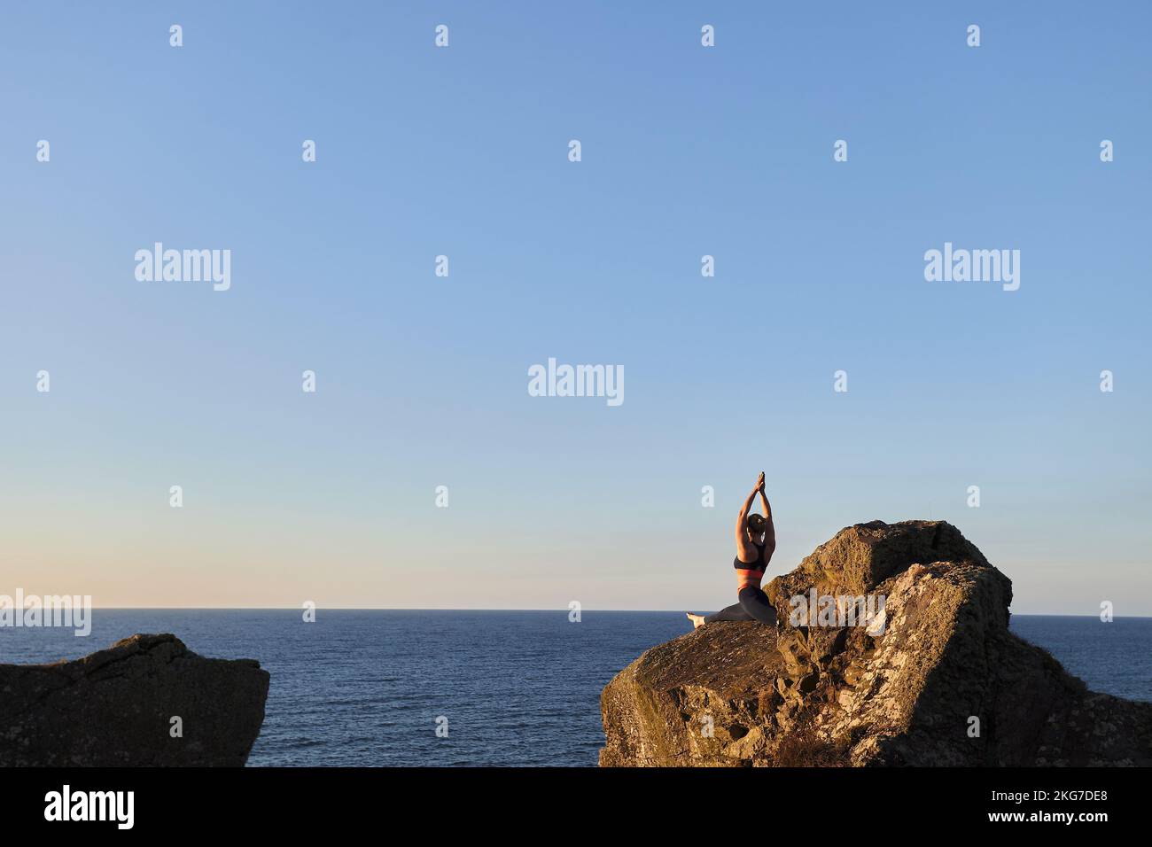 Stunning Landscape with healthy woman doing yoga pose, outdoor Stock ...