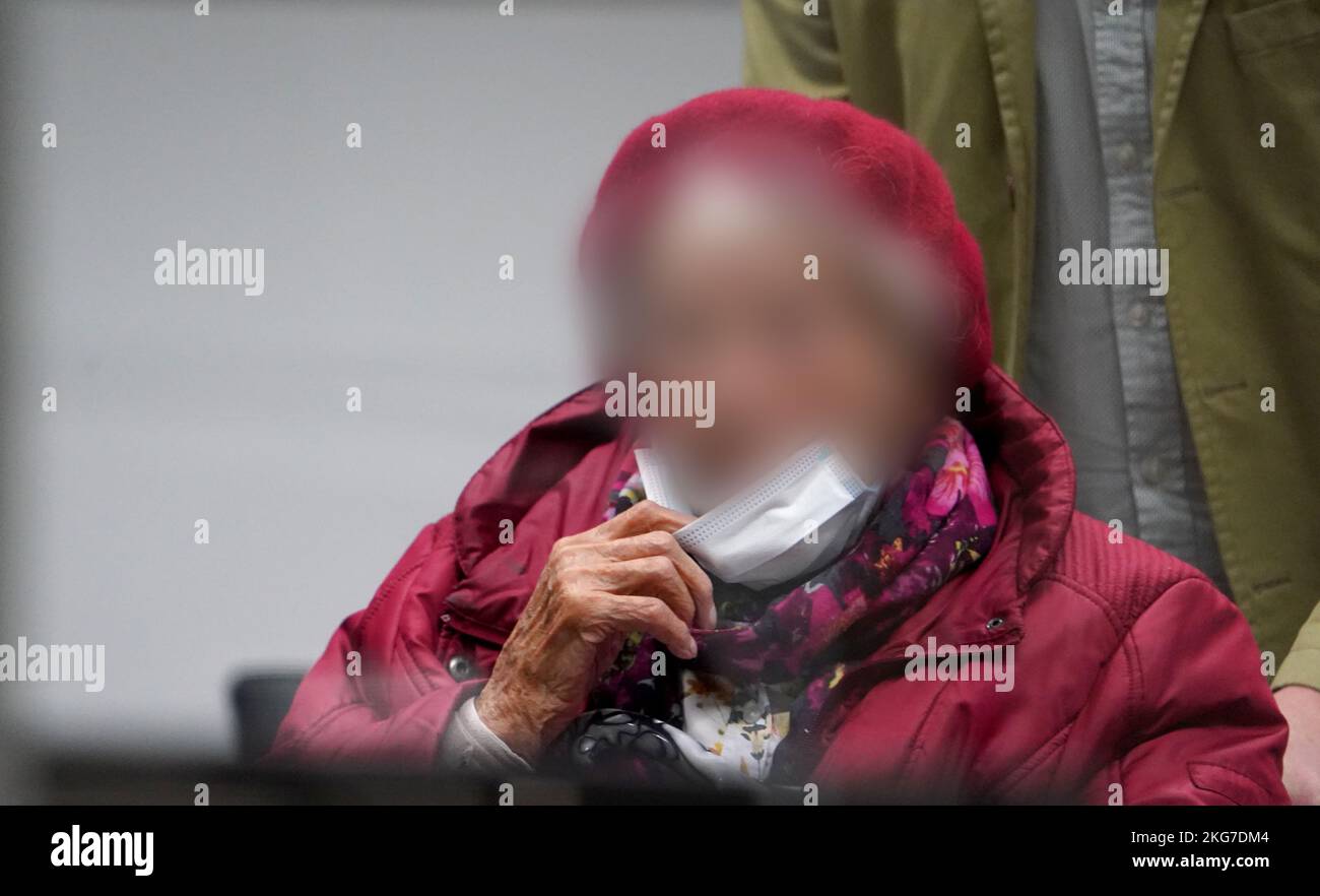 Itzehoe, Germany. 22nd Nov, 2022. The defendant Irmgard F. is brought ...
