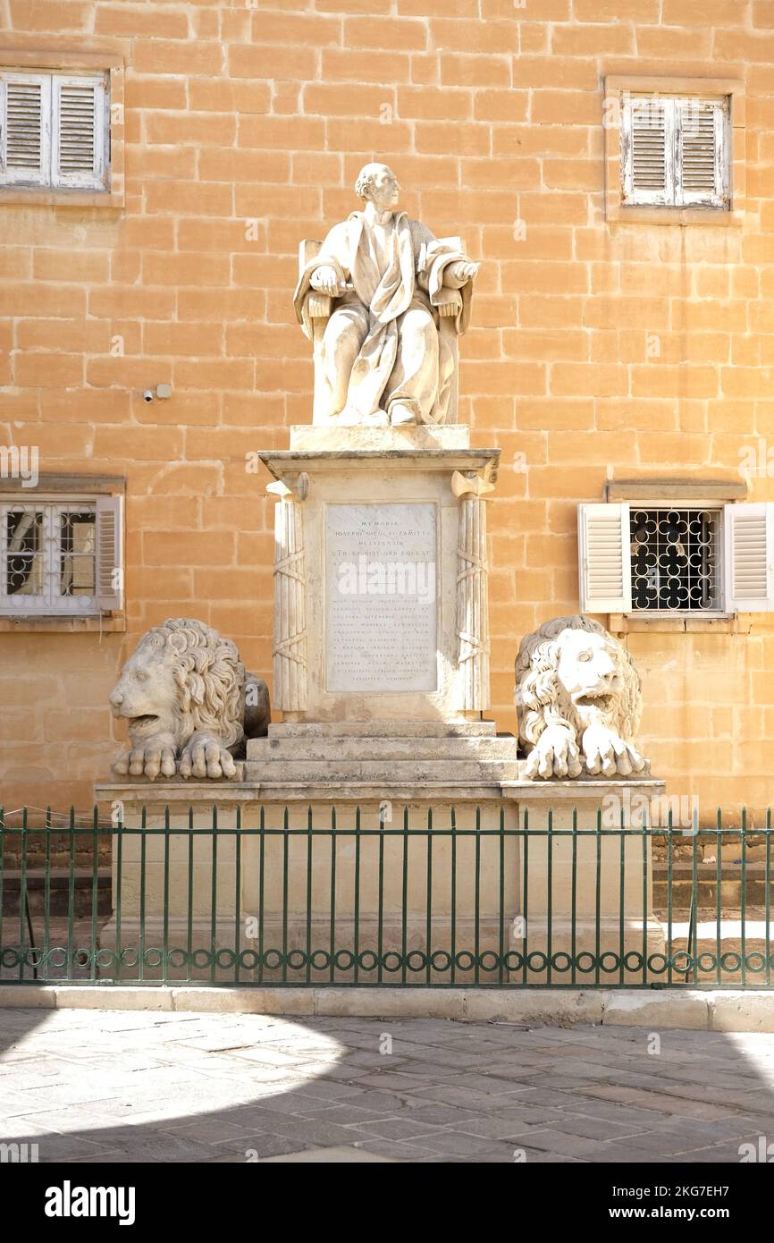A vertical shot of the statue in Malta Stock Photo - Alamy