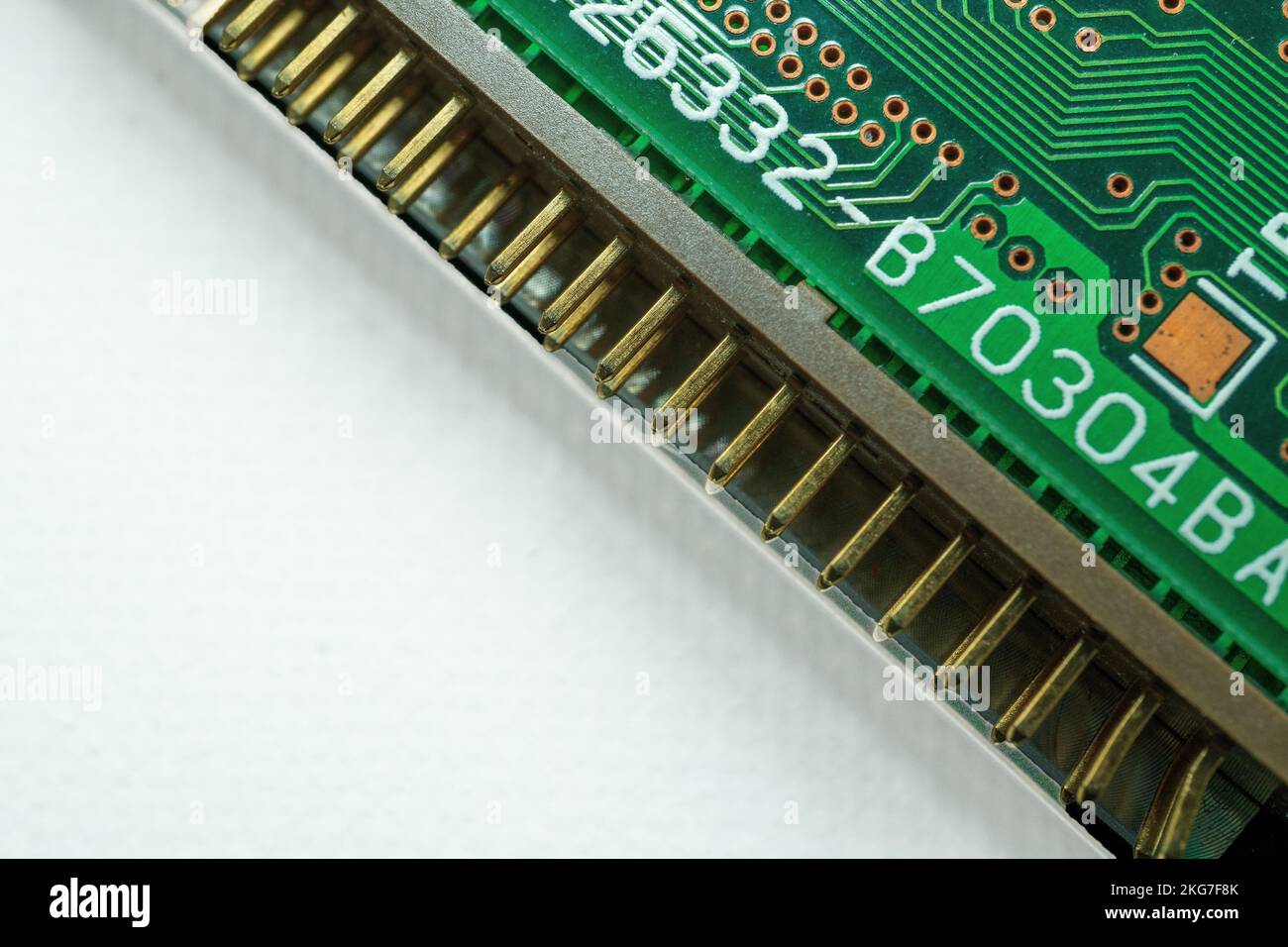 A closeup of a computer motherboard showing complicated circuits on ...