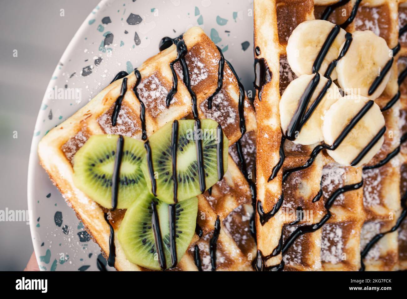 Close-up, Belgian waffles with fruits, covered with chocolate Stock ...