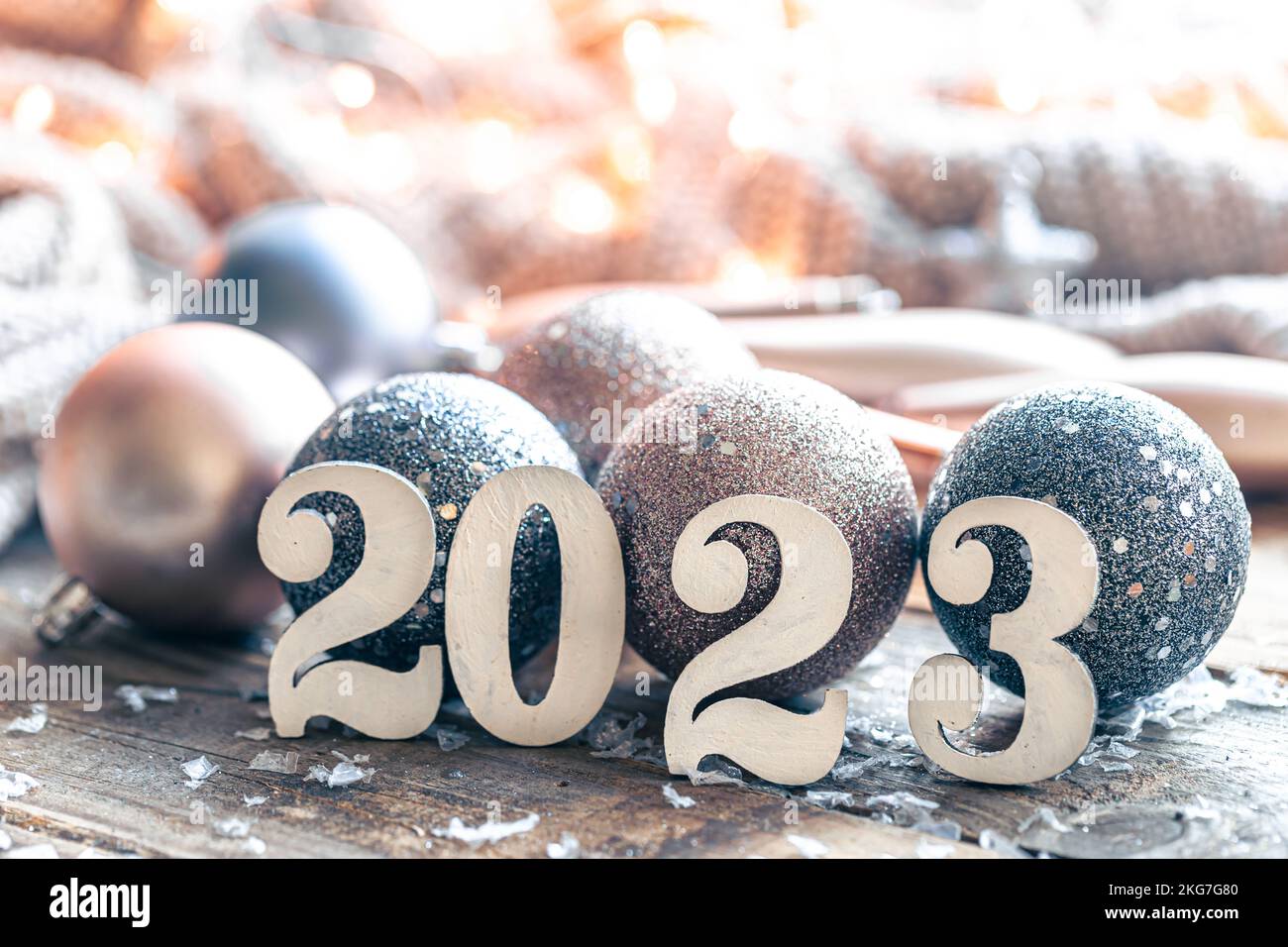 Christmas background with numbers 2023 and balls for the Christmas tree ...