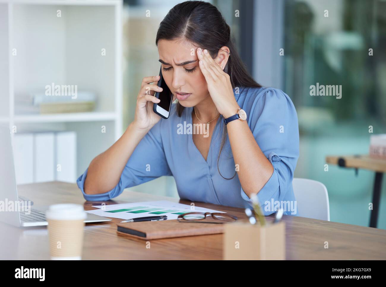 Business woman, phone call and headache in communication, stress or ...