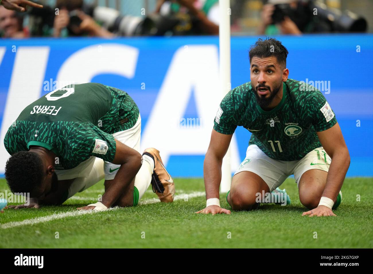 Saudi Arabia's Saleh Al-Shehri (right) celebrates scoring their side's ...