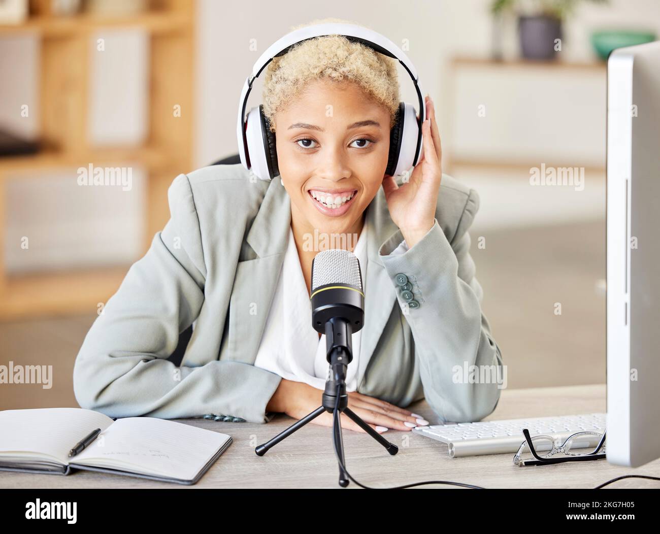 Business woman, portrait smile and podcast with headphones and ...