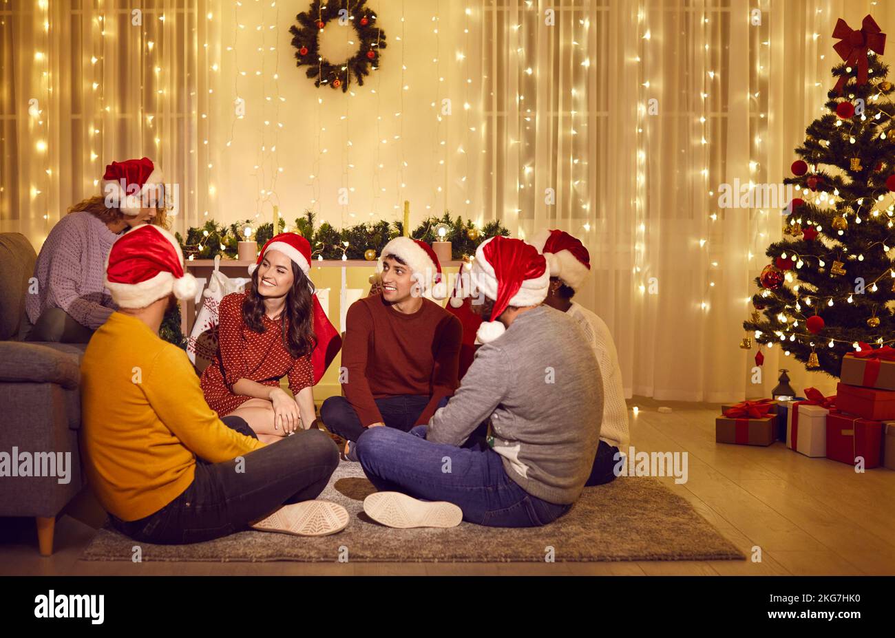 Group of happy multiethnic friends meeting all together at home on ...