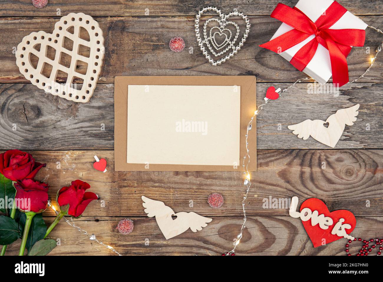 Envelope and blank paper on wooden background, Valentine's day concept ...