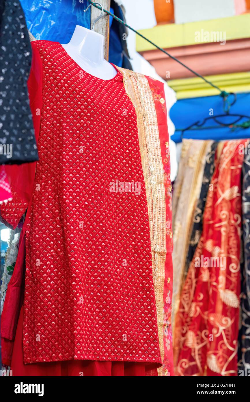 Colourful Lehenga on display for sale at the market during Deepavali or ...