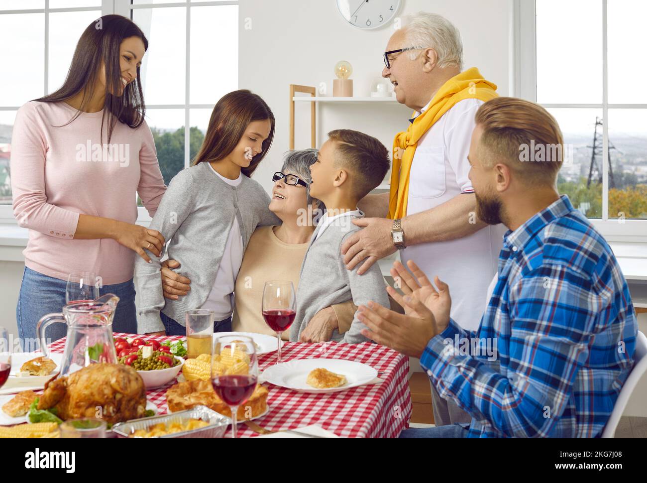 Multi-generational family is having fun while celebrating Thanksgiving ...