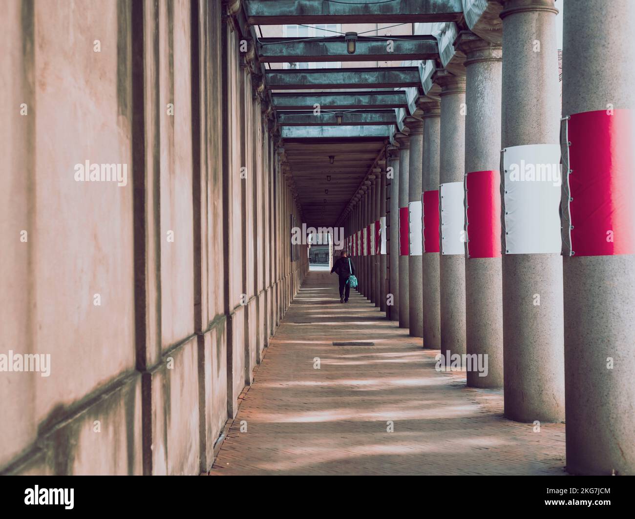 pedestrian passageway with concrete columns Stock Photo - Alamy