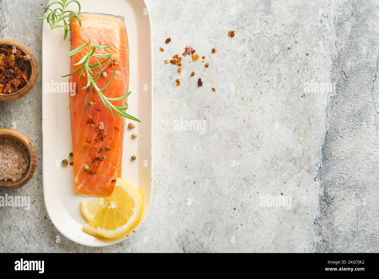 Salmon fish piece. Fresh raw salmon fish piece on marble board stand ...