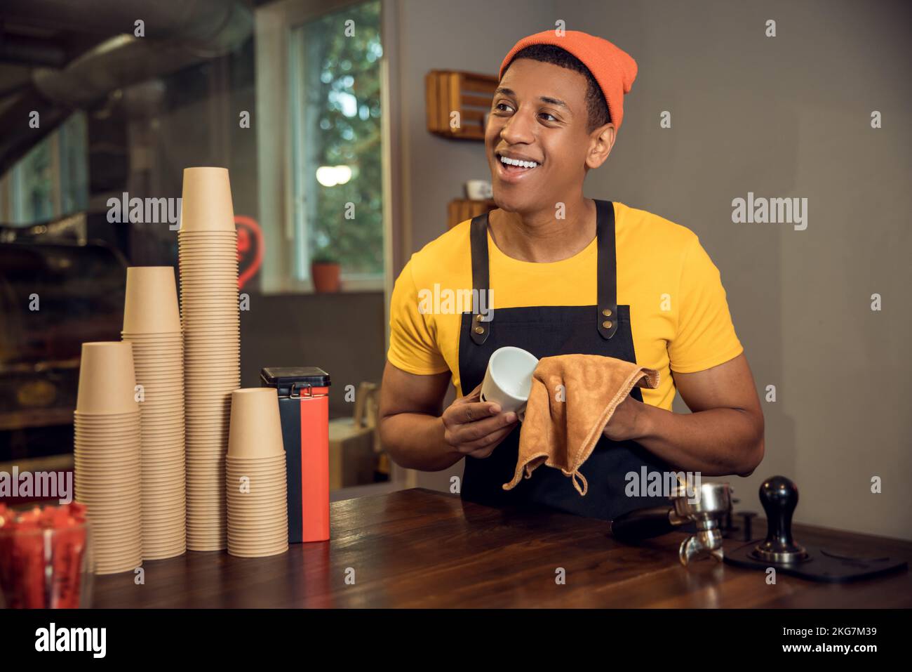 Working in a coffee shop hi-res stock photography and images - Alamy