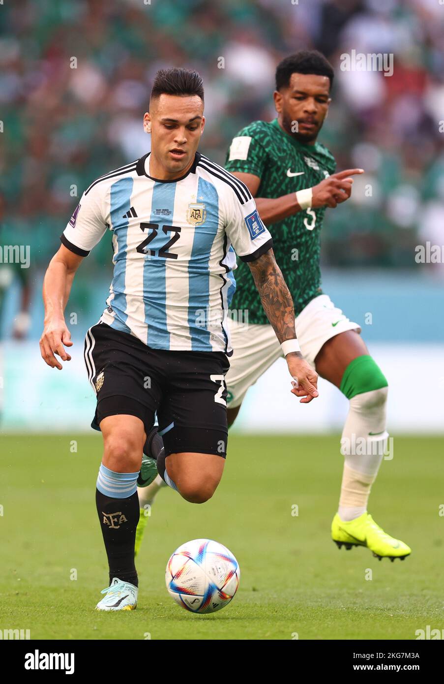 Doha, Qatar. 22nd Nov, 2022. Lautaro Martinez of Argentina surges ...