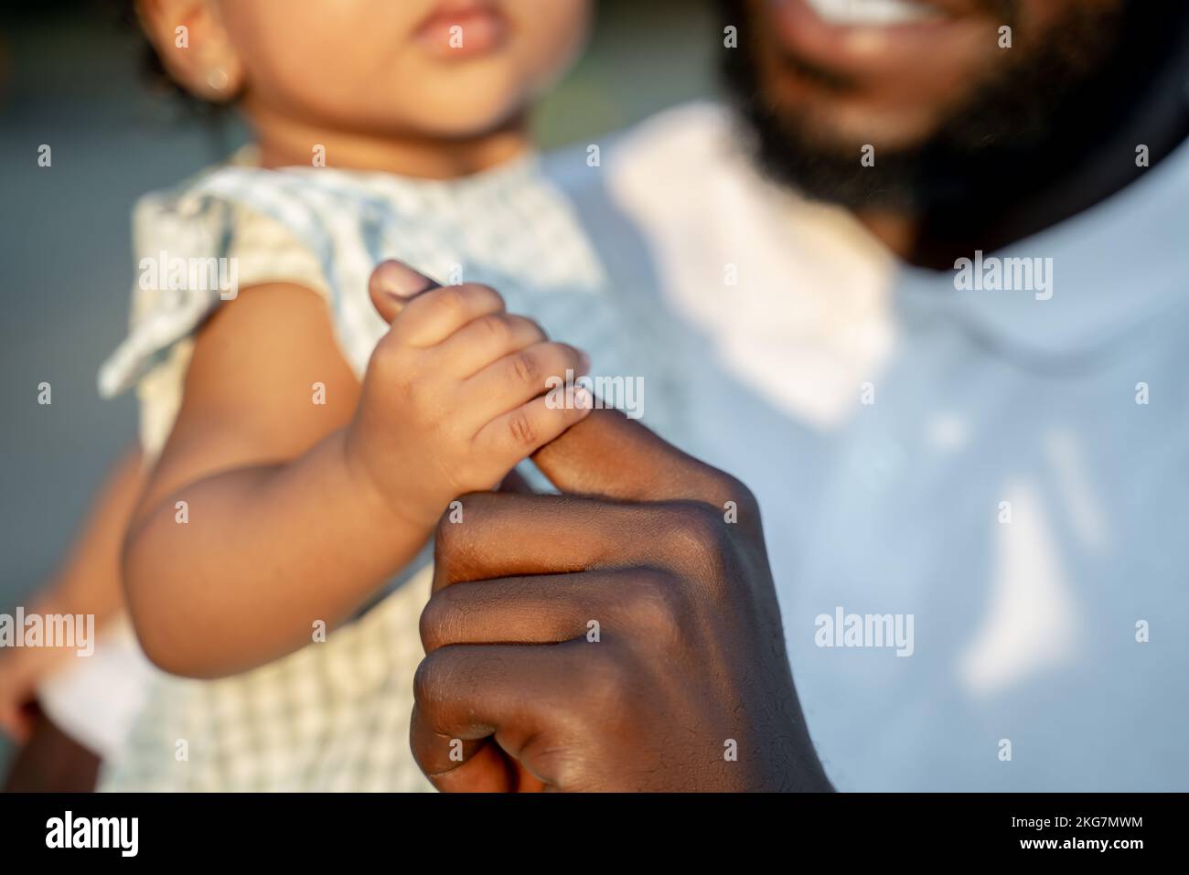 African American male parent with his daughter outside Stock Photo - Alamy