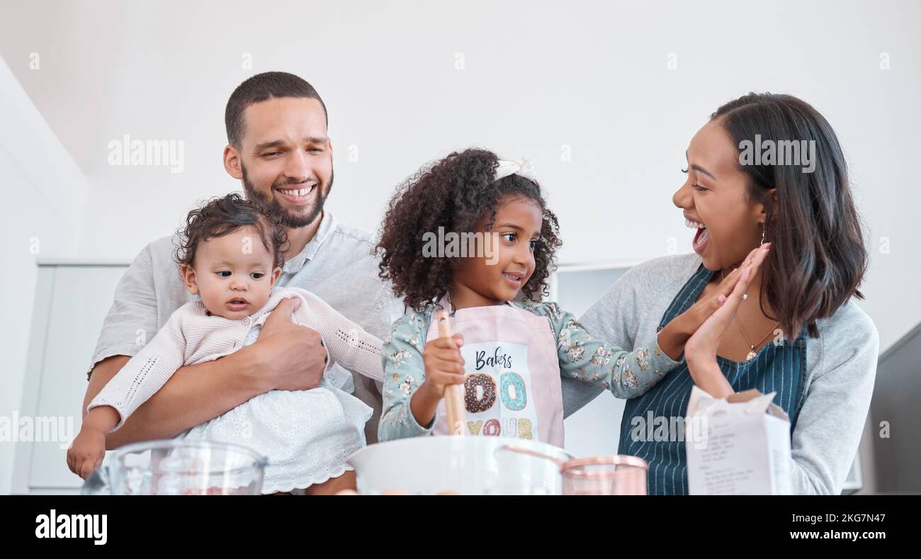 Family, cooking and learning with high five for success from supportive ...